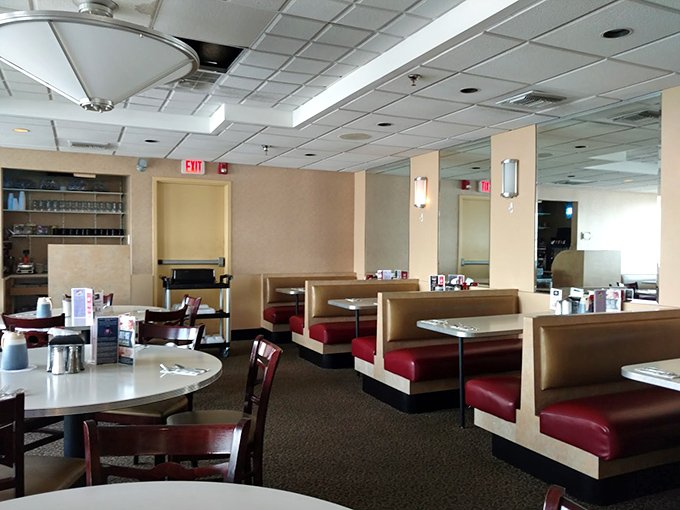 Classic red vinyl booths invite you to slide in and stay awhile. This isn't Instagram-engineered nostalgia&mdash;it's the real deal.