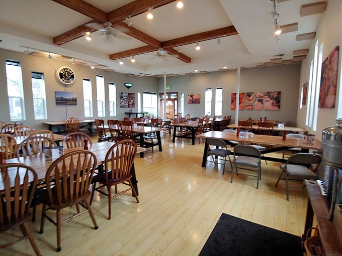 Wooden beams, natural light, and simple furnishings create a space that says, "Stay awhile, the calories don't count if you're having a good conversation."