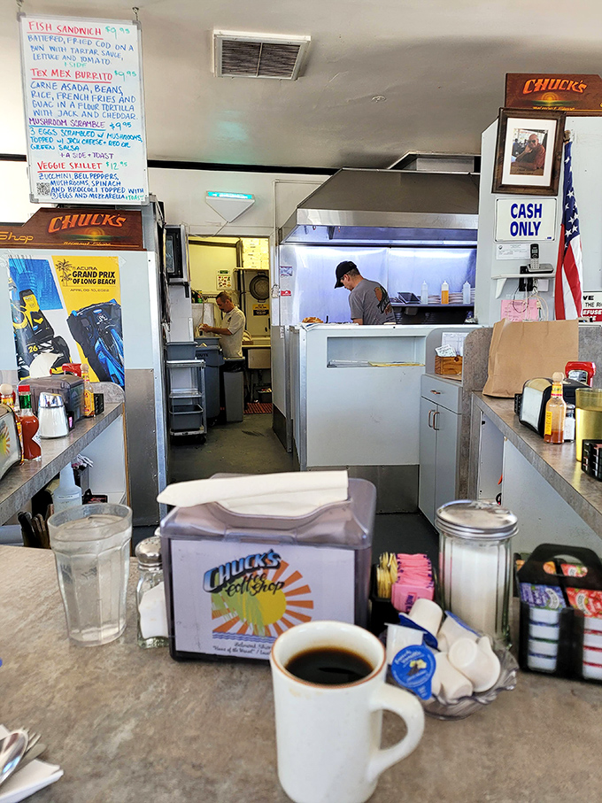 The open kitchen concept lets you witness breakfast magic unfold while savoring that perfect cup of joe.