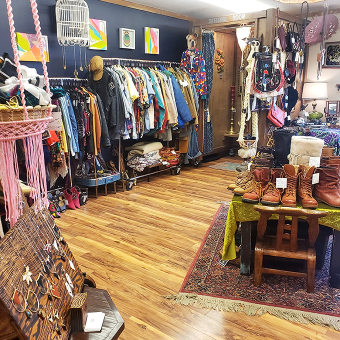 Wooden floors creak tales of yesteryear while navy walls create the perfect backdrop for this kaleidoscope of carefully curated clothing.