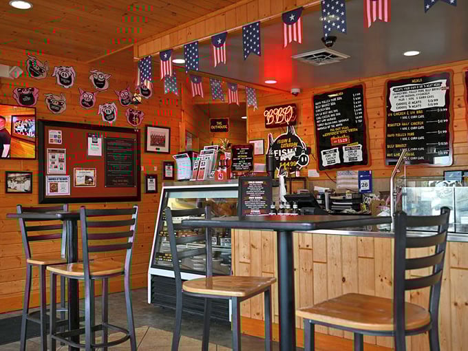 American flags hang proudly above wooden walls that have absorbed years of delicious smoky aromas &ndash; the best kind of interior decorating there is.