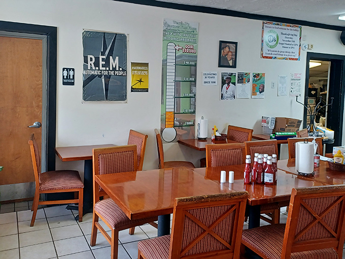 Simple wooden chairs and R.E.M. posters create the perfect backdrop for serious Southern comfort food conversations.
