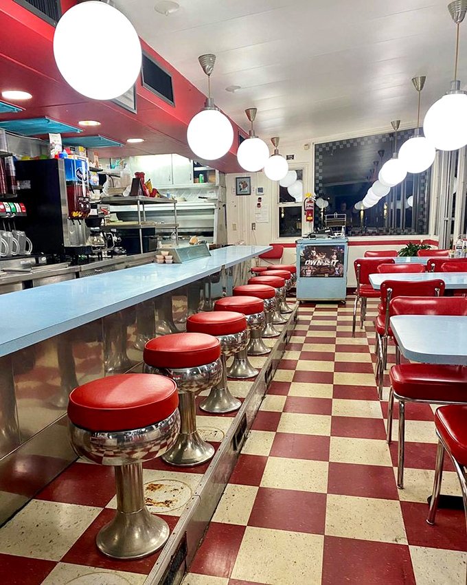 Inside, those cherry-red counter stools aren't just seating&mdash;they're front-row tickets to the greatest breakfast show in Columbia, performed daily on the sizzling griddle.
