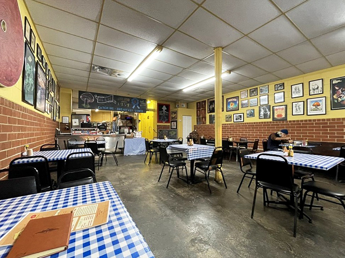 Yellow walls adorned with decades of memories and blue checkered tablecloths create the perfect backdrop for soul food communion.