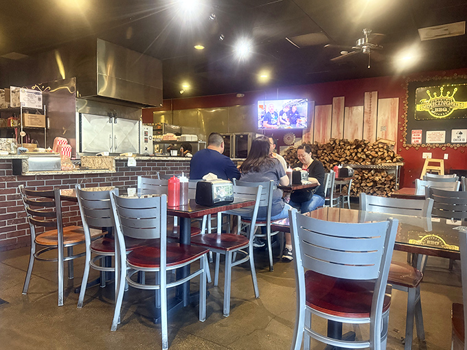 Where wood-paneled walls and metal chairs create the perfect no-nonsense backdrop for serious barbecue business.