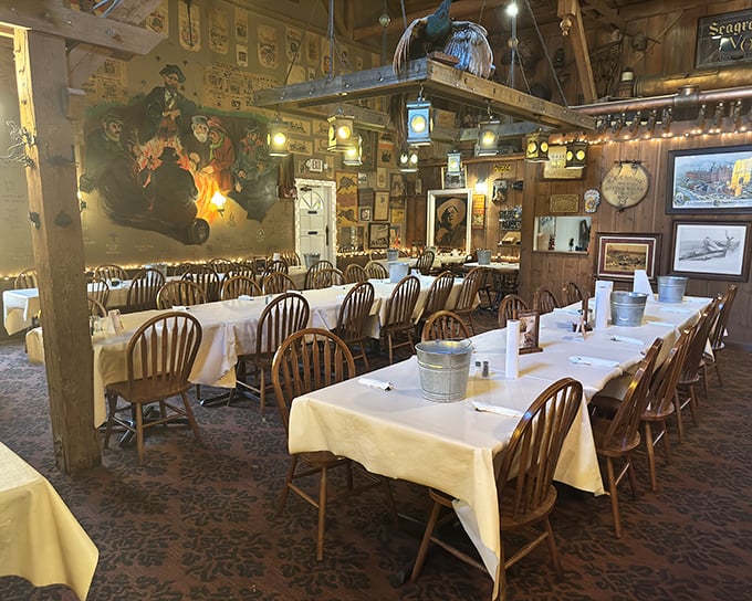 Step inside and you're transported to a bygone era where wooden beams, Windsor chairs, and walls filled with Americana create the perfect comfort food backdrop.