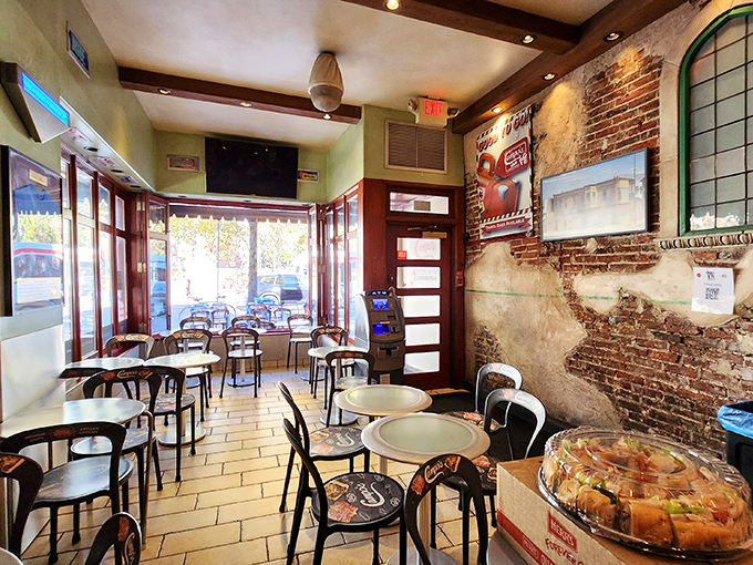 Red vinyl booths and checkerboard accents create the perfect backdrop for life's important decisions: chocolate or vanilla? Both is always the correct answer.