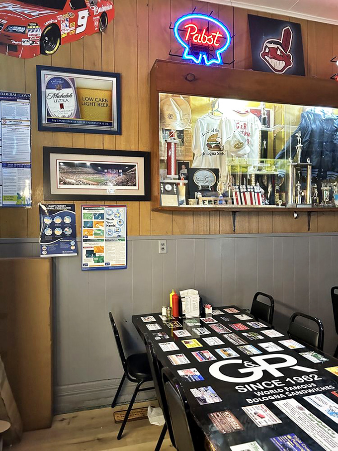 Step inside this cozy sanctuary where wood paneling and sports memorabilia create pure comfort magic.