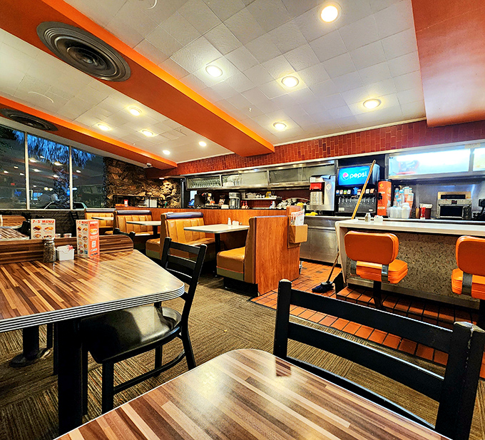 Step inside and time stands still. The orange and brown color scheme somehow works, creating an atmosphere that's both energizing and comforting.