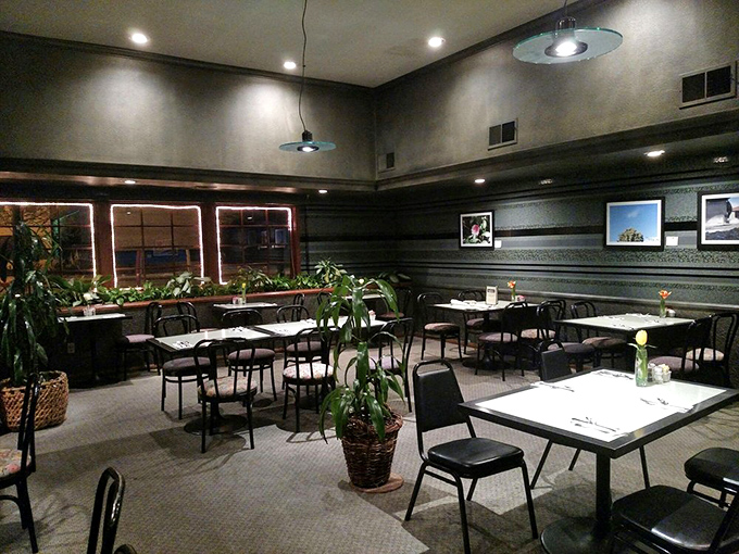 Inside, the sophisticated dark wood paneling and strategically placed greenery create an atmosphere that's both elegant and comforting&mdash;breakfast with a side of ambiance.