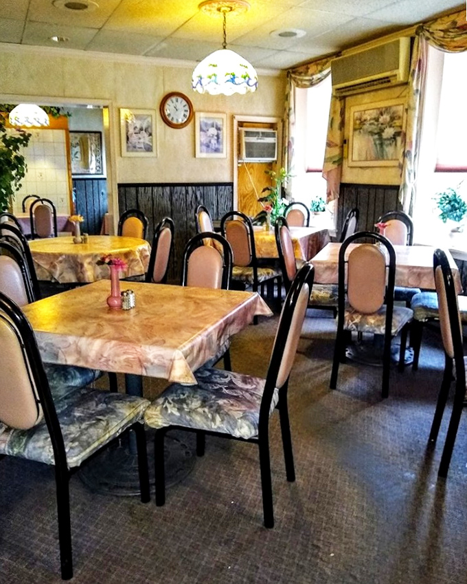 Vintage pendant lights and classic bar stools transport you to simpler times. This isn't Instagram-bait design&mdash;it's authentic Americana that's earned its patina.