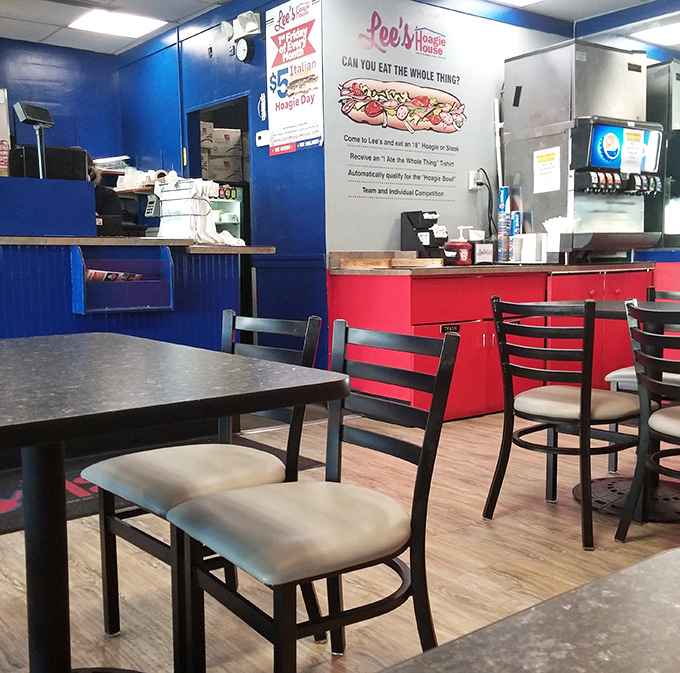 Inside, the red and blue color scheme feels like a patriotic salute to the all-American art of sandwich-making. Democracy in delicious action.