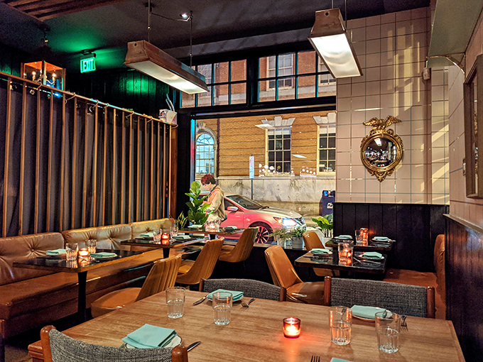 Mid-century modern meets culinary magic in this dining room where every table feels like the best seat in the house.