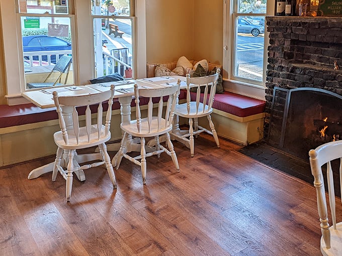 Cozy window seats and a crackling fireplace create the perfect backdrop for lingering over coffee while Pacific Grove's morning fog dissipates outside.