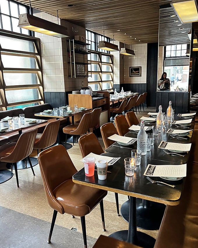 Mid-century modern meets contemporary cool in this thoughtfully designed dining room. Those leather chairs aren't just stylish&mdash;they're inviting you to stay awhile.