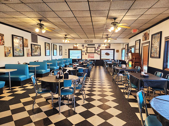 Classic checkered floors and turquoise booths create the perfect backdrop for serious comfort food conversations.