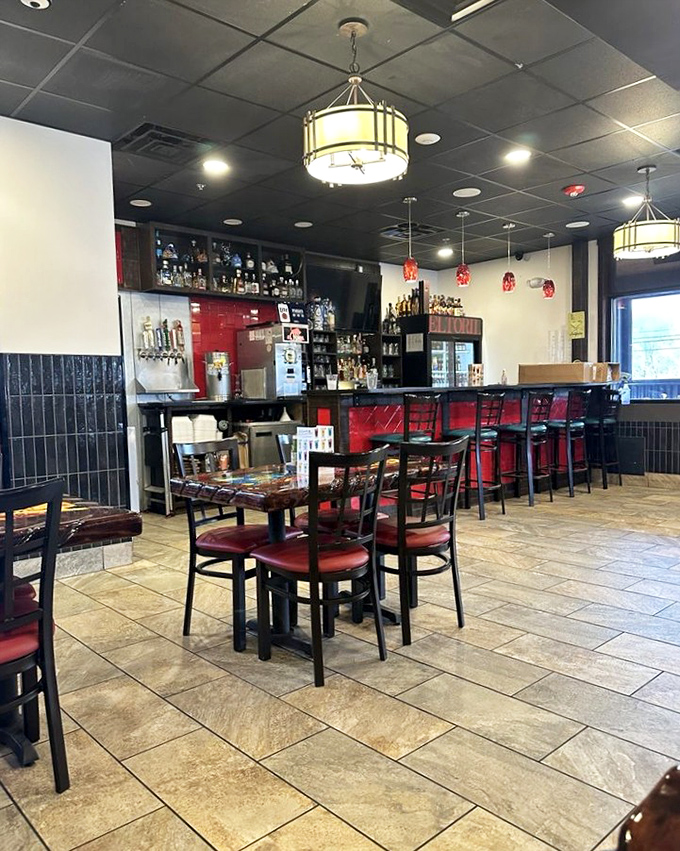 Inside, the clean lines and warm lighting create an atmosphere where the food&mdash;not the decor&mdash;takes center stage. Those pendant lights aren't just illuminating tables; they're spotlighting culinary magic.