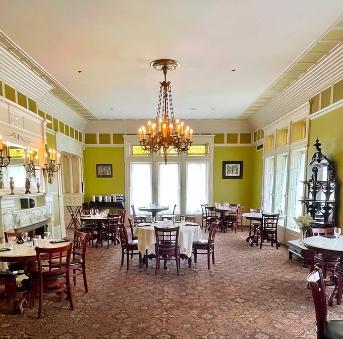 Dining rooms bathed in natural light showcase period-appropriate décor, where chandeliers that have witnessed a century of celebrations still cast their golden glow.