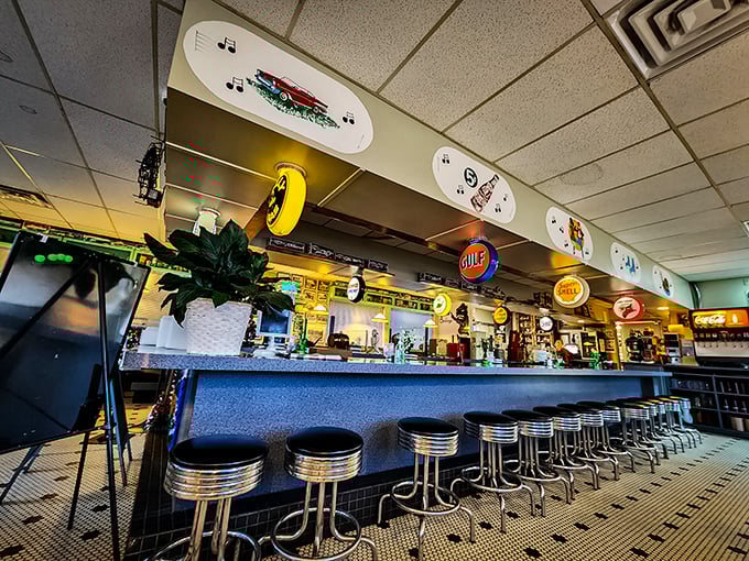 Chrome stools lined up like loyal soldiers, ready for the breakfast brigade. This counter has witnessed more morning revelations than a therapist's couch.