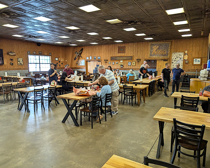Democracy in dining&mdash;wooden tables where ranchers, tech bros, and barbecue pilgrims gather in reverent silence, united by the universal language of smoked meat.