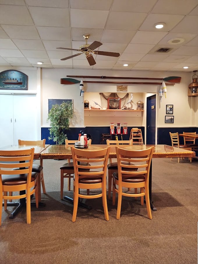 No-nonsense nautical charm meets hometown comfort, where ceiling fans spin tales of satisfied diners past.