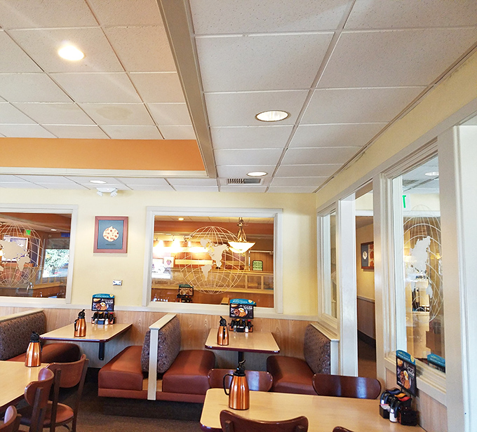 Cozy booths and warm lighting create the perfect backdrop for morning conversations and coffee refills. This is comfort before your comfort food arrives.