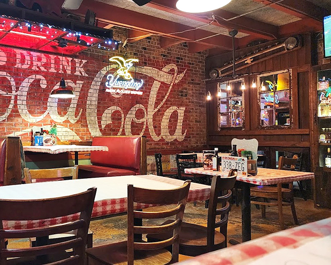 The classic Coca-Cola mural and red checkered tablecloths aren't trying to be retro-cool&mdash;they're simply authentic touches from a place that knows what works.