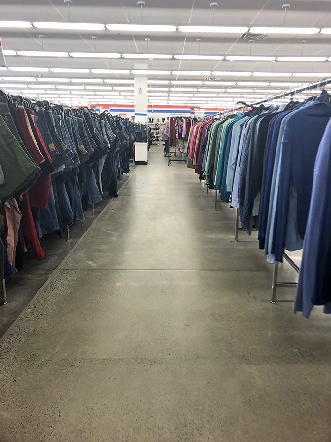 Endless racks of possibility stretch before you like a textile sea. Each hanger holds not just clothing, but potential stories waiting to be continued.