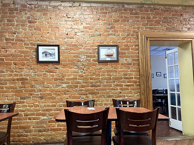 Exposed brick walls tell stories of yesteryear while wooden tables invite you to create new memories over plates of homestyle goodness.