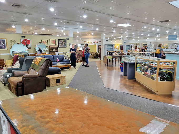 Inside, a treasure trove awaits! Furniture pieces from different eras engage in silent conversation while display cases tempt with smaller collectibles.