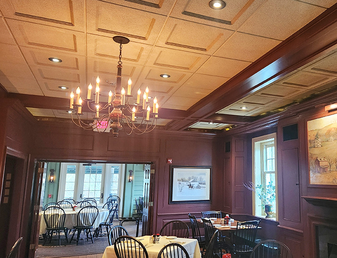 Warm wood paneling and elegant chandeliers create that rare atmosphere where you could propose marriage or debate baseball with equal comfort.