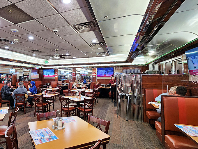 Inside, red vinyl booths and polished chrome create that perfect nostalgic backdrop where memories are made and pancakes are devoured.