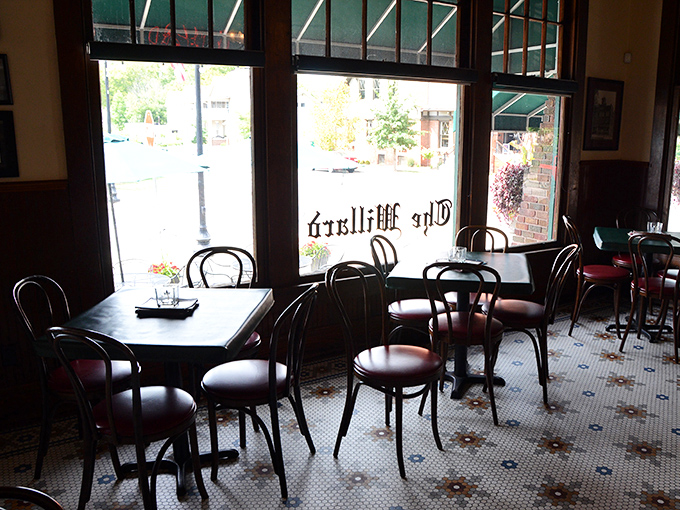 Classic bentwood chairs and vintage tile floors set the scene for culinary nostalgia. This isn't Instagram-bait decor&mdash;it's the real deal, where conversations matter more than selfies.