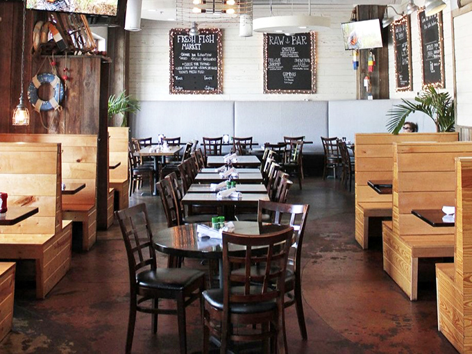 Nautical meets neighborly in this dining room where wooden booths and maritime accents remind you that great seafood doesn't require a beach view.