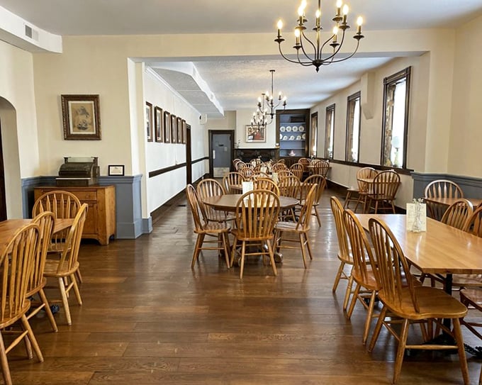 Windsor chairs and polished wood floors create an atmosphere where time slows down. History doesn't just hang on these walls—it's baked into every floorboard.