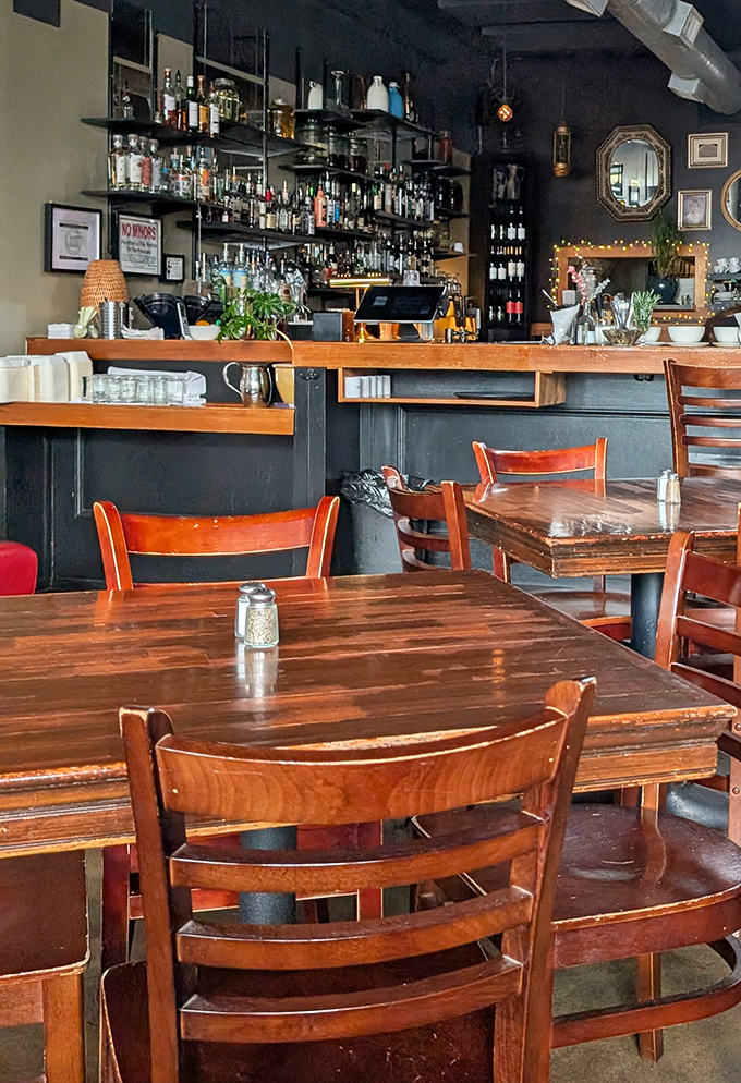 Warm wooden tables and a well-stocked bar create that perfect "I could stay here all evening" atmosphere.