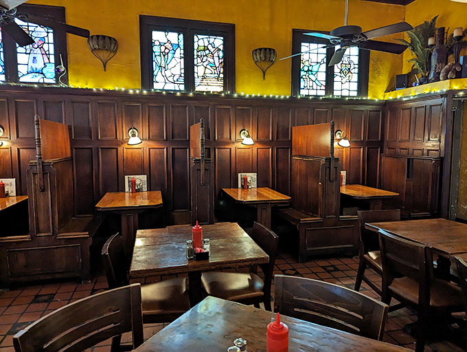 Step inside and time stands still&mdash;dark wood paneling, stained glass windows, and cozy booths create an atmosphere that's equal parts nostalgia and neighborhood comfort.