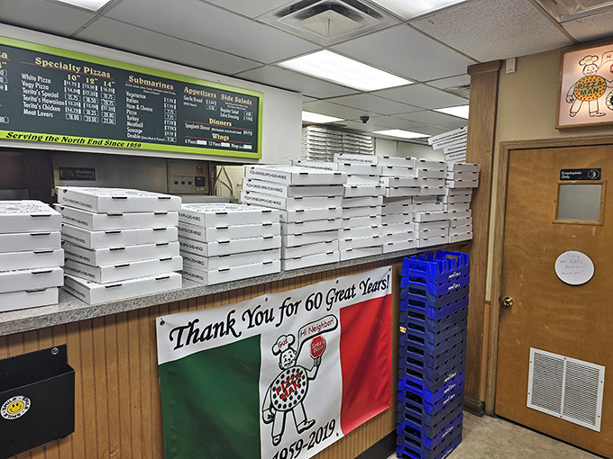 Pizza box architecture at its finest. Decades of satisfied customers have kept these stacks perpetually in motion, a testament to Columbus' enduring love affair.