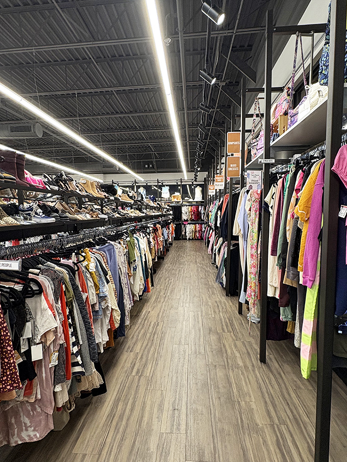 Racks upon racks of carefully curated clothing create a secondhand paradise where organization reigns supreme and impulse purchases await.
