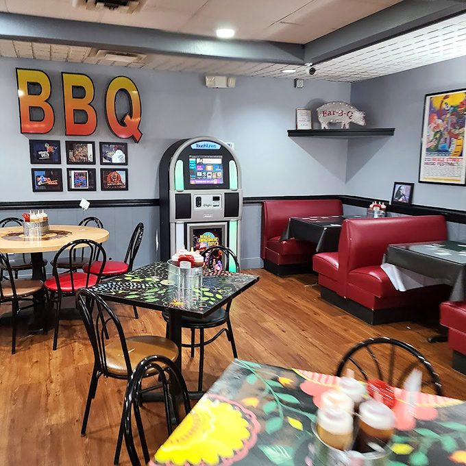 Step inside where vintage jukebox meets modern comfort, creating the perfect backdrop for serious barbecue conversations and even better food.