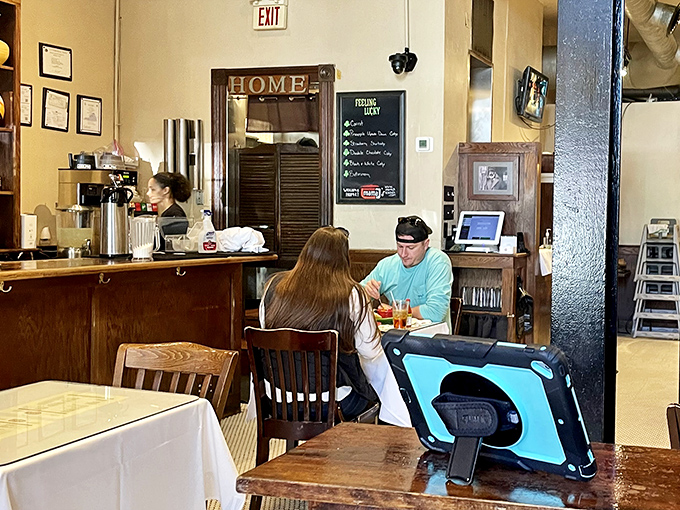 That "HOME" sign isn't just decoration&mdash;it's truth in advertising. The cozy interior makes first-time visitors feel like they've been coming here for years.