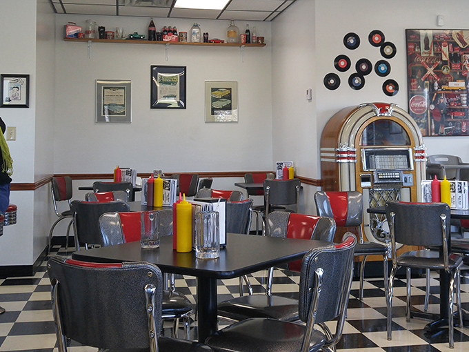 Vinyl records and chrome chairs create the perfect backdrop for root beer revelry. This isn't retro by design—it's authentic by survival.