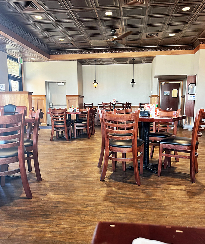Warm wood tones and classic diner seating create that "where everybody knows your name" vibe, minus the Cheers theme song.