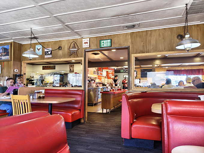 Wooden Windsor chairs await beneath simple chandeliers, a dining room where conversations flow as freely as the gravy that's surely coming your way.