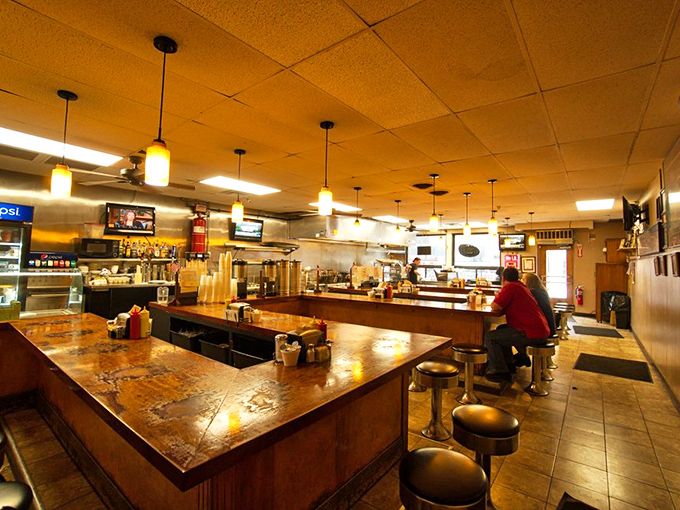 Where wine meets design &ndash; PRIME's interior marries modern elegance with steakhouse warmth. That floor-to-ceiling wine display isn't just storage, it's art.