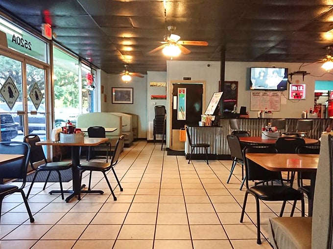 Inside, ceiling fans lazily spin above no-nonsense tables and chairs&mdash;a refreshing reminder that the real stars here are on your plate, not the decor.