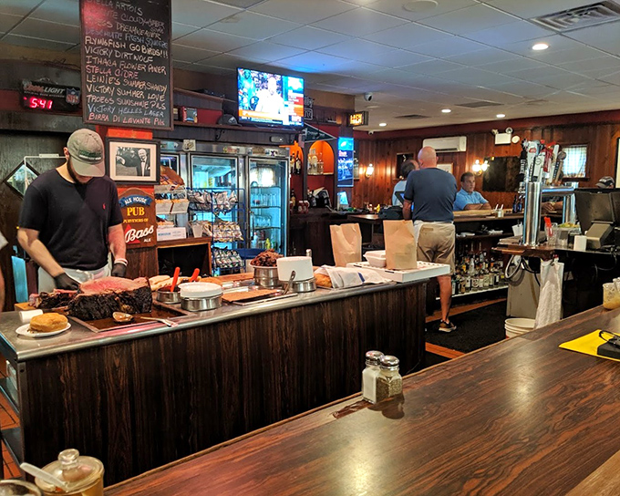 Where magic happens. The wood-paneled interior with its carving station feels like stepping into a time when restaurants cared more about flavor than Instagram filters.