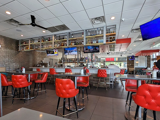 Those red tufted bar stools aren't just seating&mdash;they're front-row tickets to the culinary show that unfolds 24/7.