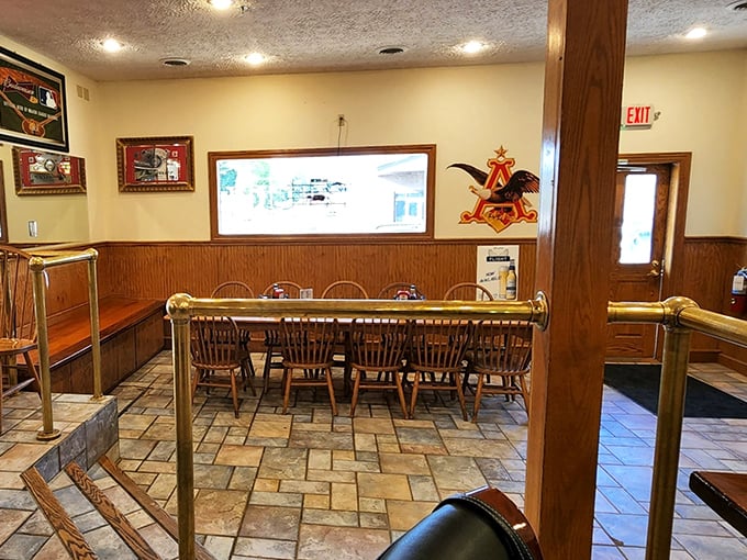 Wooden paneling, comfortable seating, and stone-tiled floors create that "everybody knows your name" atmosphere that chain restaurants spend millions trying to replicate.