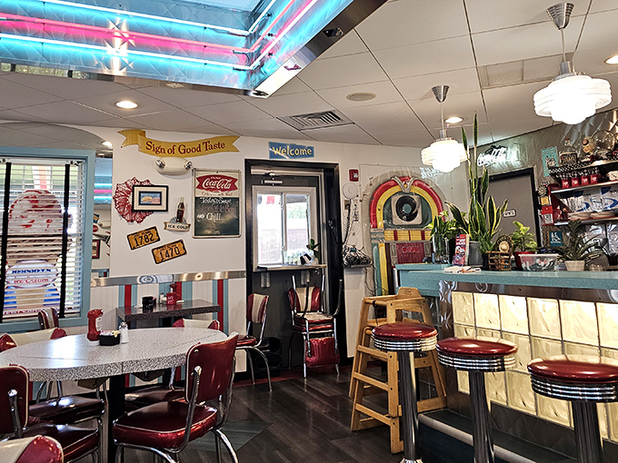 Step inside and the 1950s wrap around you like a warm hug. Neon lights, chrome accents, and that jukebox aren't just decor&mdash;they're a homecoming.